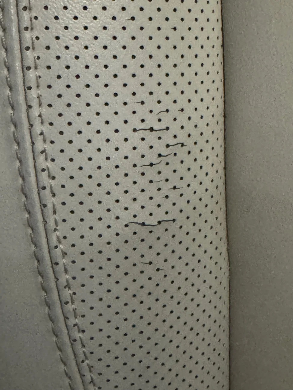 Driver seat leather tearing in just 39K miles | MachEforum - Ford ...