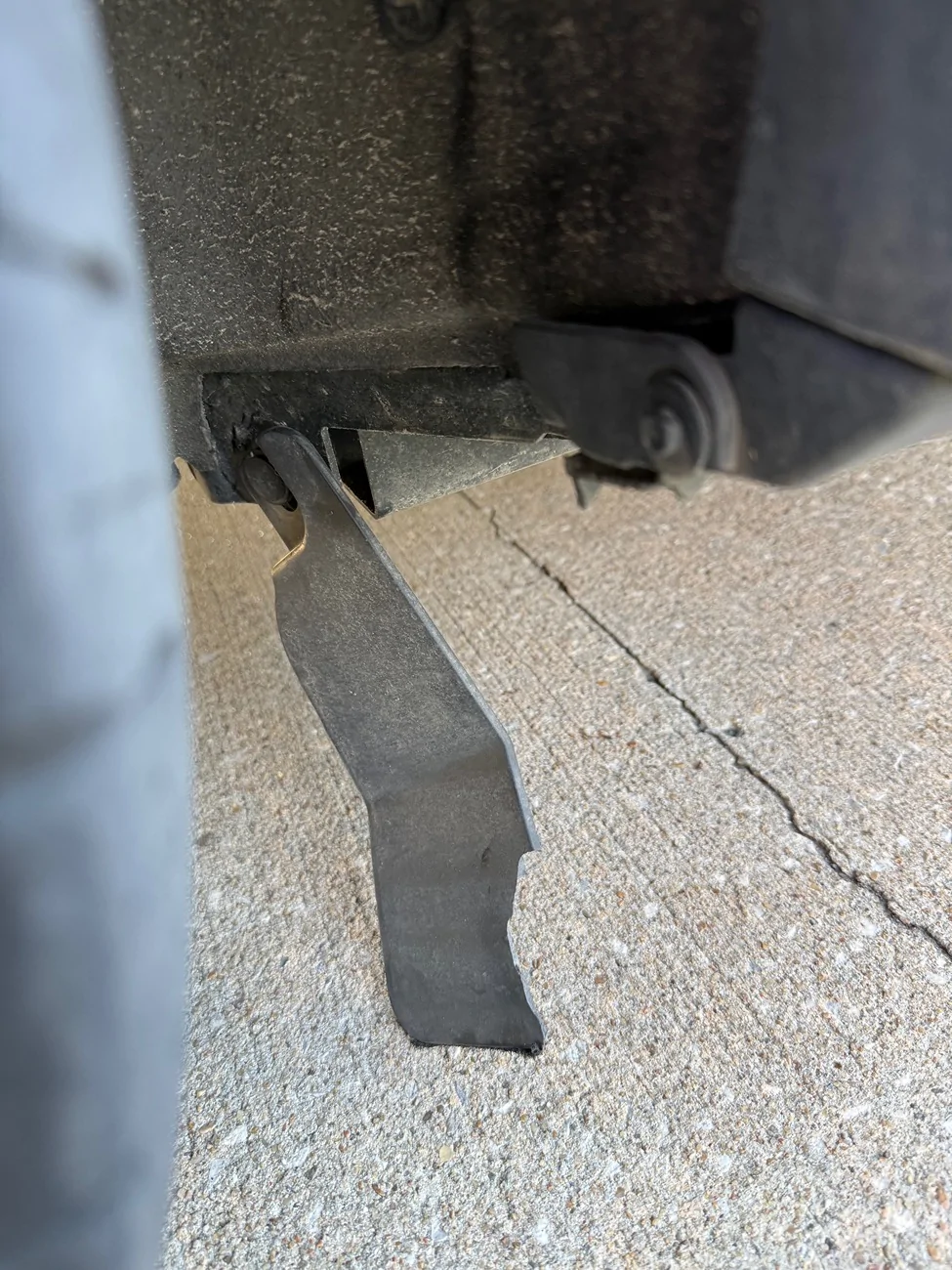 Need a part name for a broken tire guard | MachEforum - Ford Mustang ...